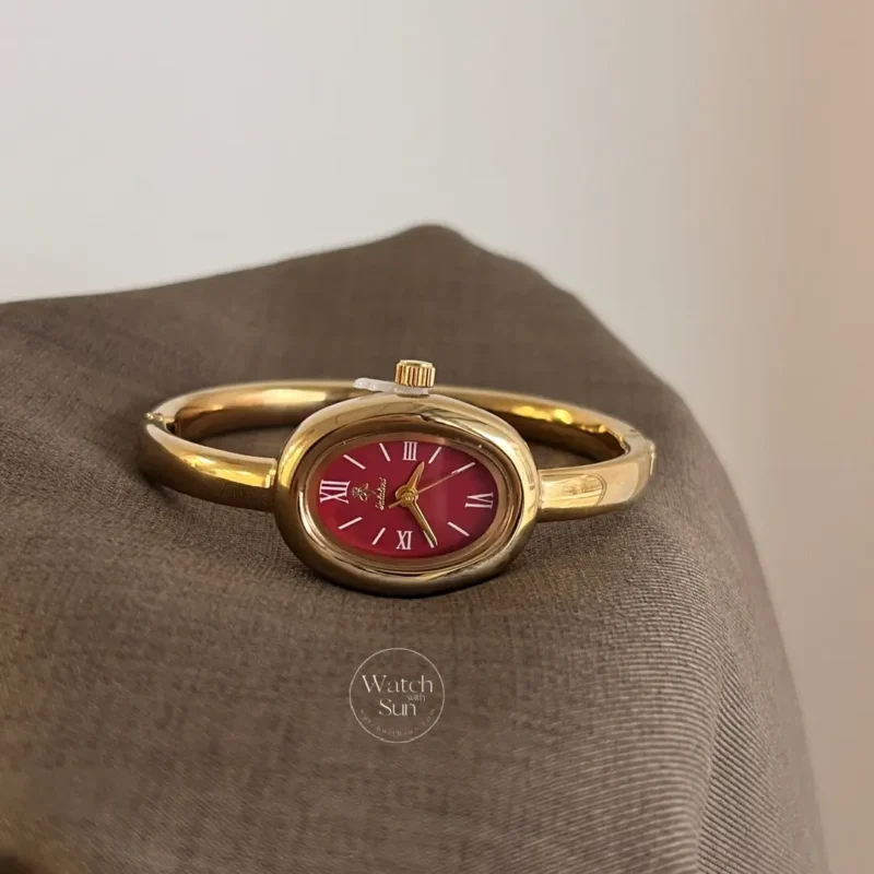 Chic Oval Burgundy Dial Gold Bangle Ladies Watch - WatchwithSun-Dainty ...